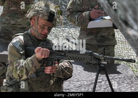 U.S. Army Pfc. Damon Manning, 1st Signal Brigade, attempts the deadlift ...