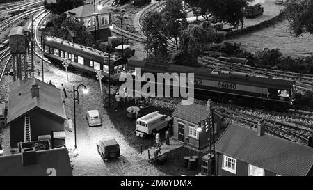 A class 66 and an Inspection saloon in EWS branding Stock Photo - Alamy