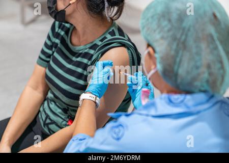 Old doctor in vaccination concept Stock Photo - Alamy