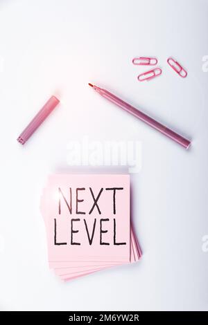 Hand writing sign Next Level. Word for having more than one floor and ...