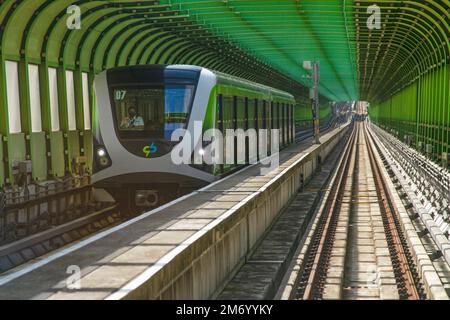 Taichung MRT train passes above the road Stock Photo - Alamy