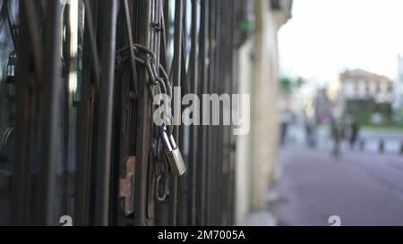 Store front gate closed, close-up lock Stock Photo - Alamy