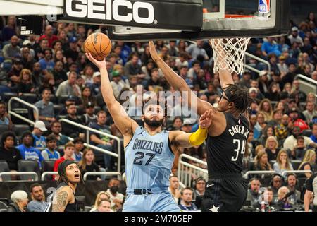 Memphis Grizzlies forward David Roddy (27) guards Charlotte Hornets ...