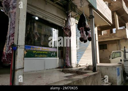 Animal slaughtering according to Muslim halal rules in a village near ...