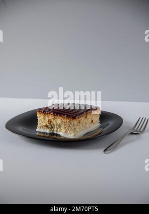Turkish light dairy dessert trileche Stock Photo - Alamy