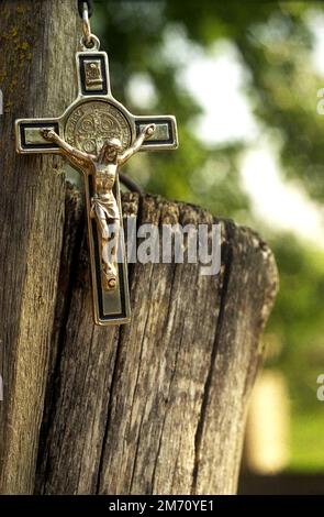 Pendant with Jesus christ crucified. Crucifix Stock Photo - Alamy