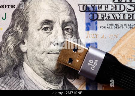 100 dollar banknote with black USB Type-C cord for design purpose Stock ...
