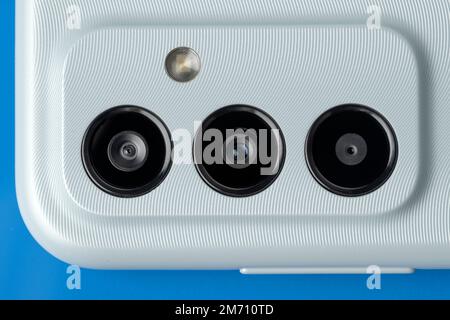 Cell phone camera lens. The concept of a smartphone rear camera lens ...