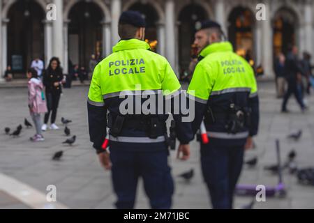 Italian police squad patrol formation back view with "Local Police ...