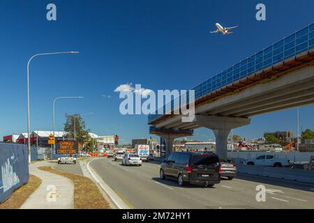 An aircraft landing above the 'Sydney Gateway' road expansion and ...