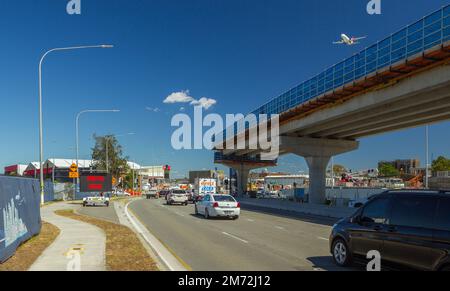 An aircraft landing above the 'Sydney Gateway' road expansion and ...
