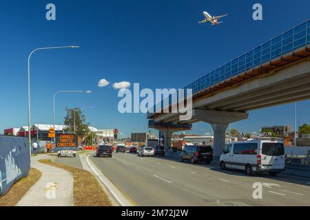 An aircraft landing above the 'Sydney Gateway' road expansion and ...