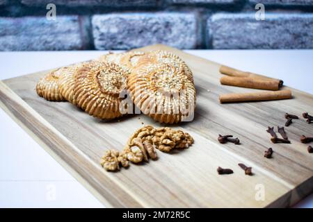 Traditional Turkish cookies, sesame and walnut filled cookies name ...