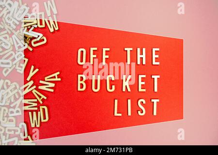 BUCKET in wooden English words language capital letters spilling from a ...