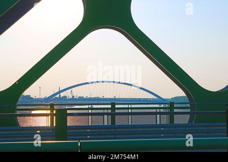 The view of Apollo bridge through arches of Old Bridge over the Danube ...
