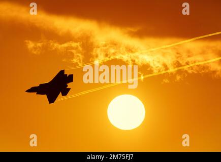 F-35 Fighter jet at sunset. Modern military fifth generation fighter ...