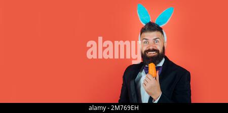 Easter Egg surprise. Surprised hipster hold eggs. Bearded man open ...