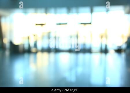 blurry image of a spacious lobby in a modern office building Stock ...