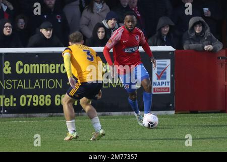 Myles Weston of Dagenham and Redbridge and Josh Casey of Woking during ...