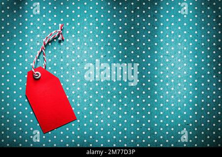 Price label on blue polka-dot background Stock Photo - Alamy