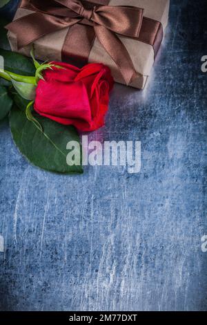 Giftbox with red bow on metallic background holidays concept Stock ...