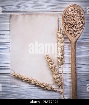 Wheat ears vintage clean paper sheet on wooden board Stock Photo - Alamy