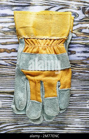 Safety gloves on wooden board copy space construction concept Stock ...