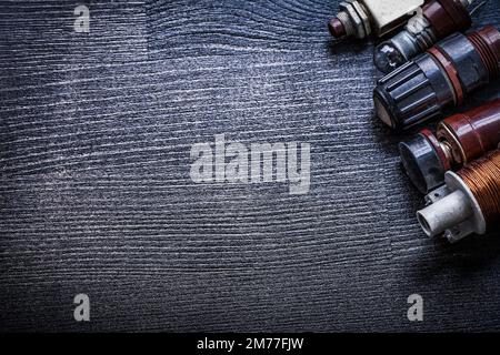 Set of electric devices on metallic background vintage electricity ...