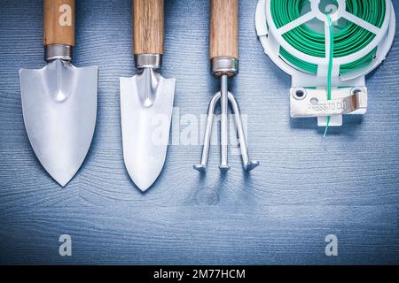 two garden spades and fork Stock Photo - Alamy