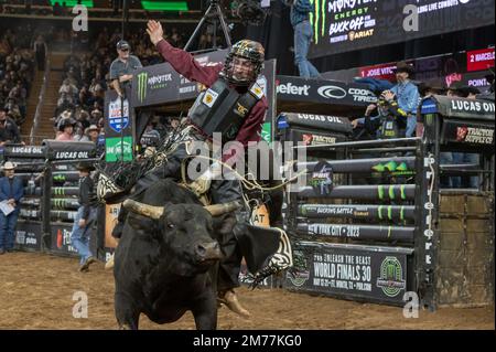 Professional Bull Rider rides Daniel Keeping bull Outlaw during PBR ...