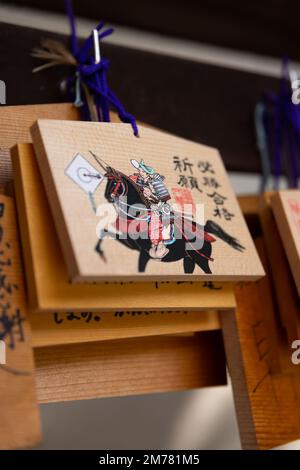 A votive wooden tablet at Tomioka Shrine close up Stock Photo - Alamy