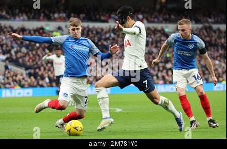 L-R Zak Swanson of Portsmouth and Tottenham Hotspur's Heung-Min Son and ...