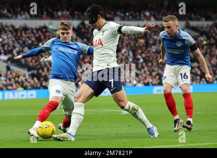 L-R Zak Swanson of Portsmouth and Tottenham Hotspur's Heung-Min Son and ...