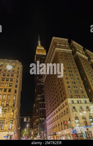 Beautiful night view of 34th Street in New York with a glimpse of the ...