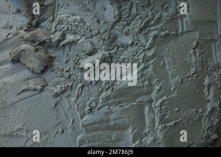 Liquid cement solution. View from top. Close-up building material ...