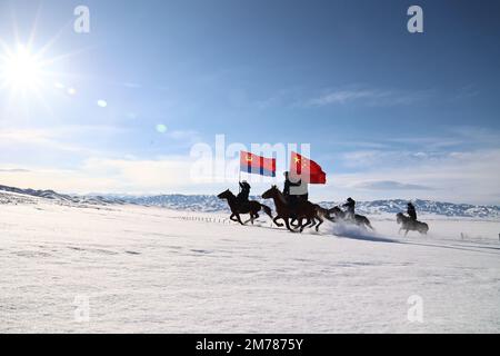 ALTAY, CHINA - JANUARY 8, 2023 - Chinese police patrol the border in ...