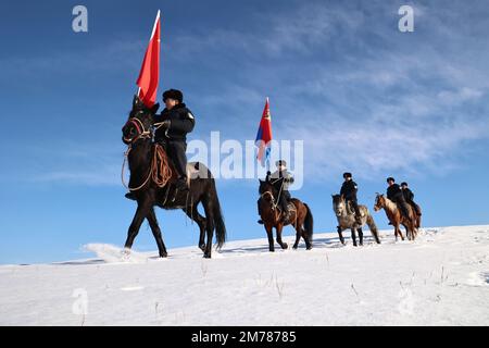 ALTAY, CHINA - JANUARY 8, 2023 - Chinese police patrol the border in ...