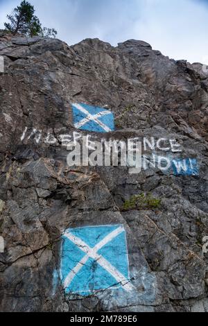 Scottish Independence protest painted onto a rock face alongside the A9 ...