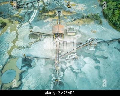 Stone crushing system at open pit mining quarry Stock Photo - Alamy