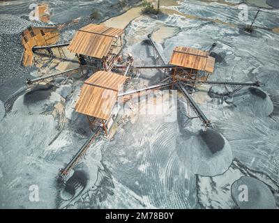 Stone crushing system at open pit mining quarry Stock Photo - Alamy