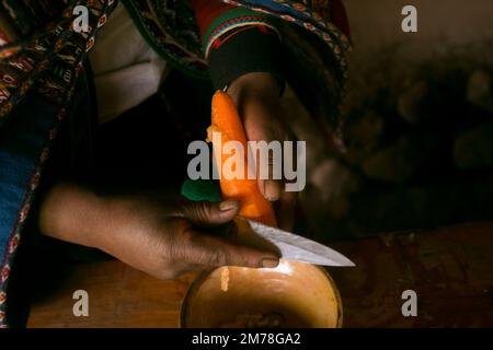 Cooking a traditional Andean vegetable soup before a Pachamanca feast ...