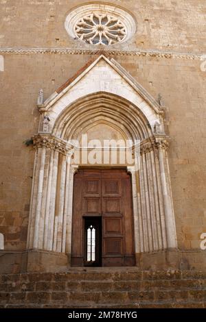 Monticchiello, Italy. Exterior view of the church of the medieval-era ...