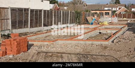 Concrete blocks foundation of a new house material Stock Photo - Alamy