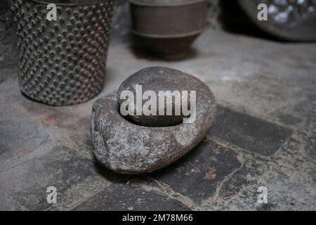 Batan is a lithic object used to grind food in Peru and western Bolivia ...