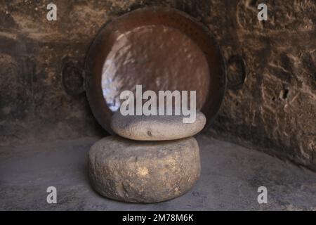 Batan is a lithic object used to grind food in Peru and western Bolivia ...