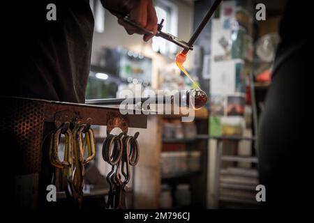 creative artisan glass blower working in a studio Stock Photo - Alamy
