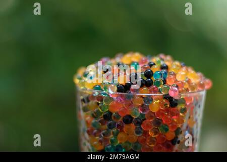 The orbeez toy, colorful flexible gel balls in the glass Stock Photo ...