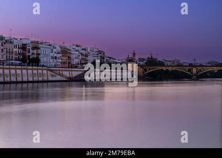 Sunset over the authentic neighborhood of Tirana in Seville with views on Calle Betis, Torre ...