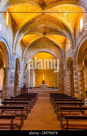 The illuminated ceiling vault of Sovana Cathedral, below the baptismal ...