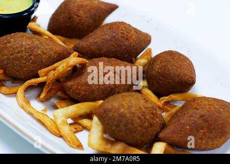 lamb kibbeh or kebbeh, popular middle eastern arabic snack in mezze ...